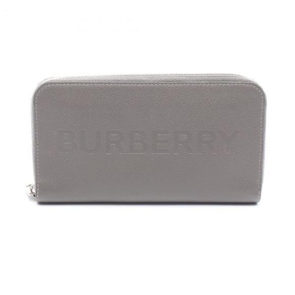 Burberry | Accessories | Burberry Embossed Logo Round Long Wallet ...